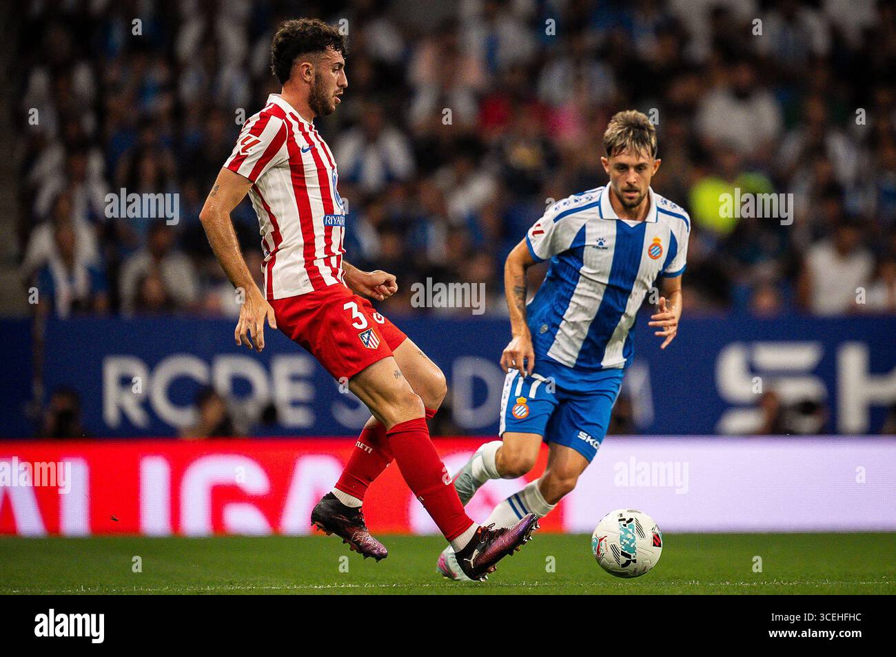 Matteo RUGGERI of Atletico Madrid and Jofre CARRERAS of Espanyol ...