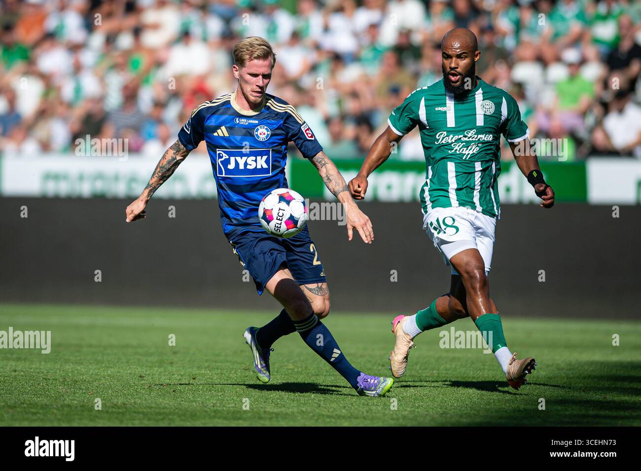 Viborg, Denmark. 17th, August 2025. Tonni Adamsen (23) of Silkeborg IF and Jean Manuel Mbom (18 ...