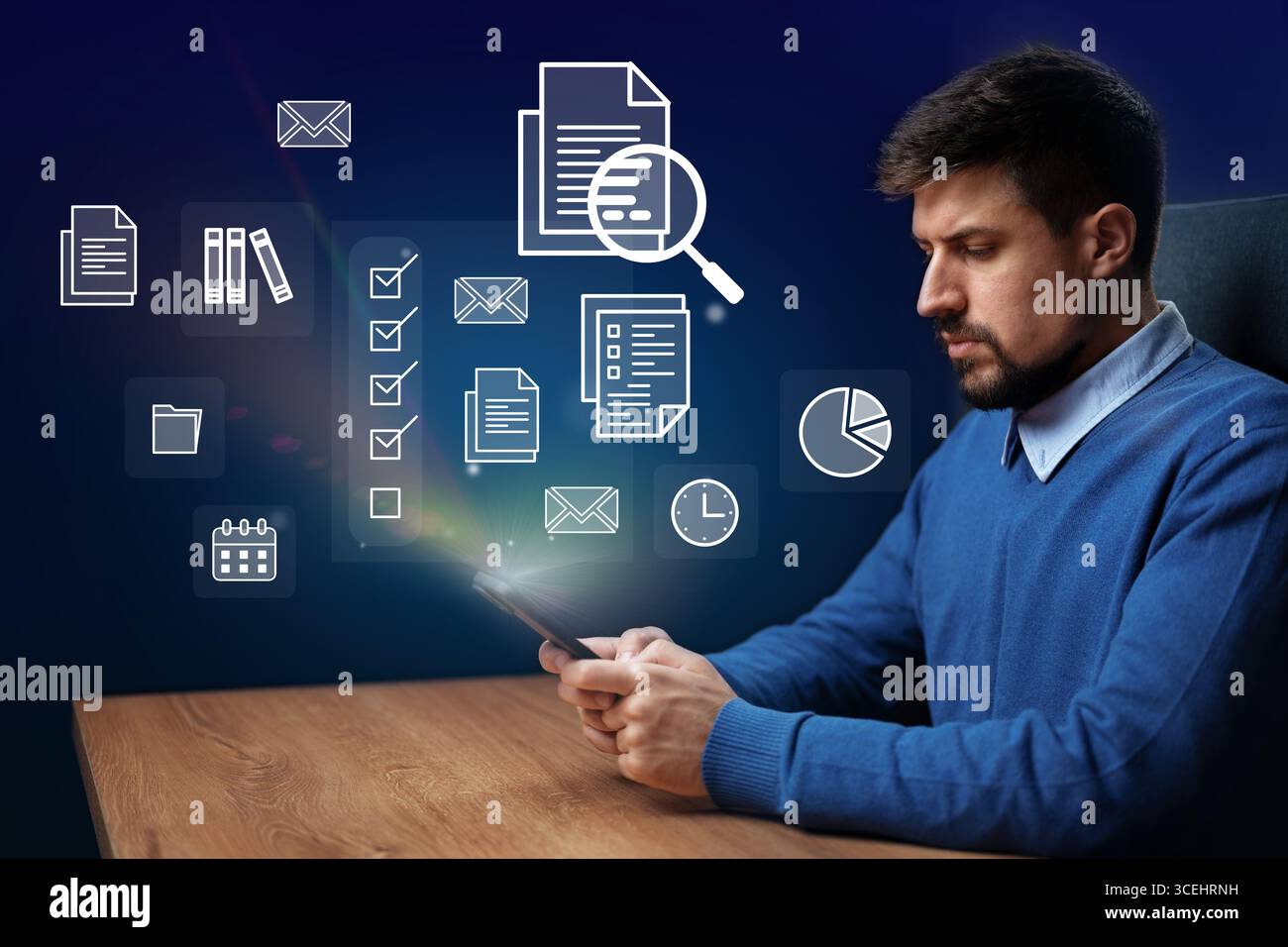 Professional man analyzing documents and data on portable device in ...