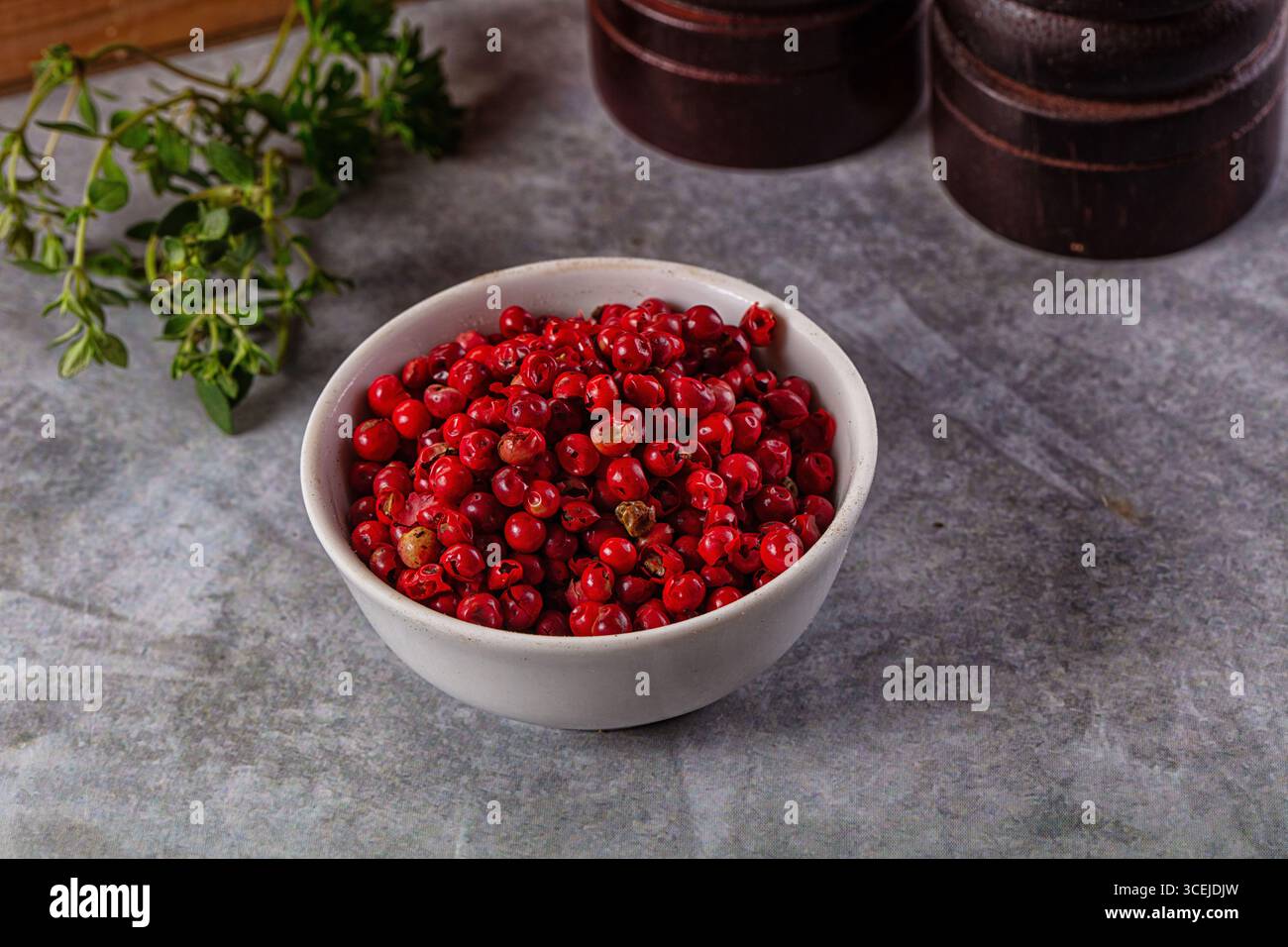 Dry pink pepper corn spice aroma seasoning Stock Photo - Alamy