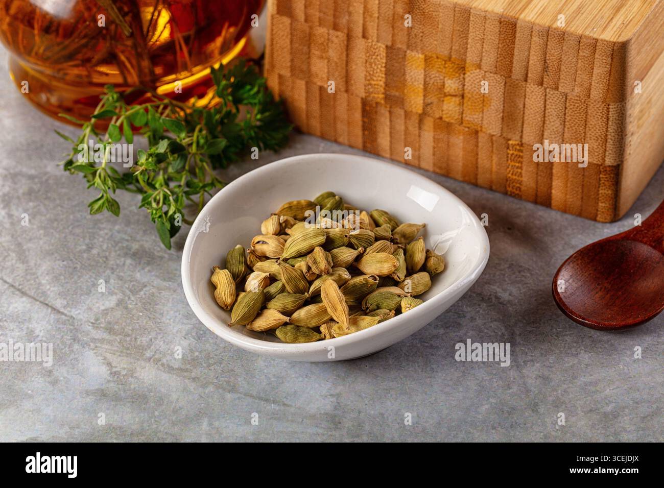 Green dry cardamom heap spices aroma for cooking Stock Photo - Alamy