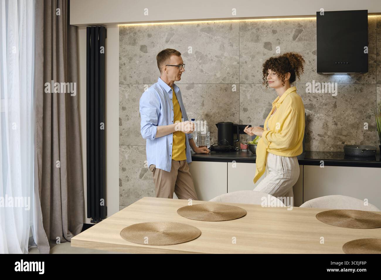 Married couple discusses plans hi-res stock photography and images - Alamy