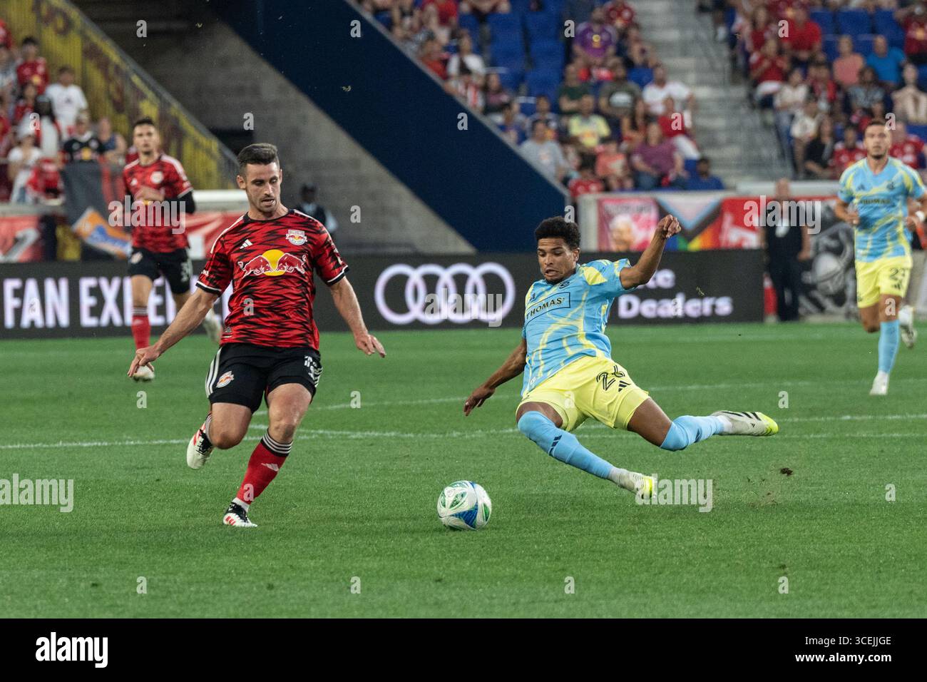Dylan Nealis (12) of Red Bulls and Nathan Harriel (26) of Philadelphia ...