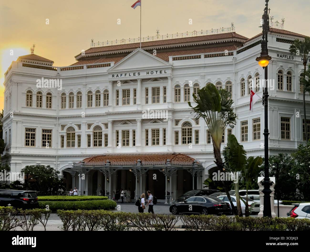 A picturesque view of the iconic Raffles Hotel in Singapore, captured ...