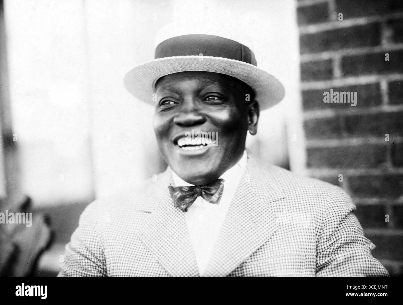 Jack Johnson and his "golden smile". Photo by Underwood & Underwood, c ...