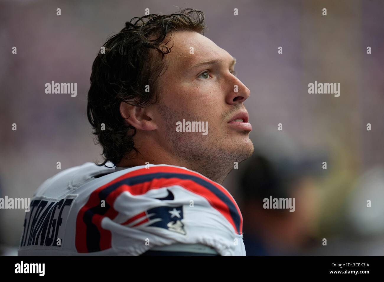 New England Patriots guard Cole Strange (69) stands on the field before ...