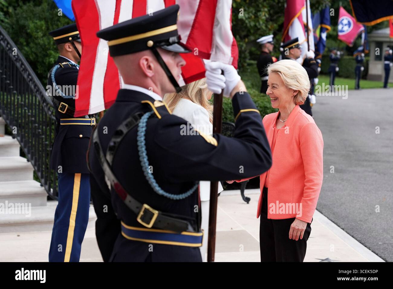 Monica Crowley, White House chief of protocol, obstructed center, greets European Commission ...