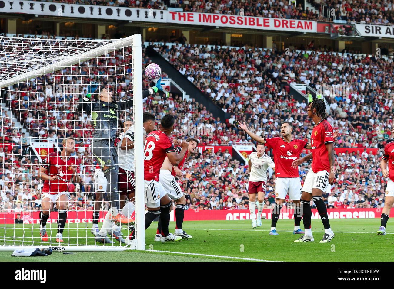 Manchester United goalkeeper Altay Bayındır (1) pushes the ball away ...