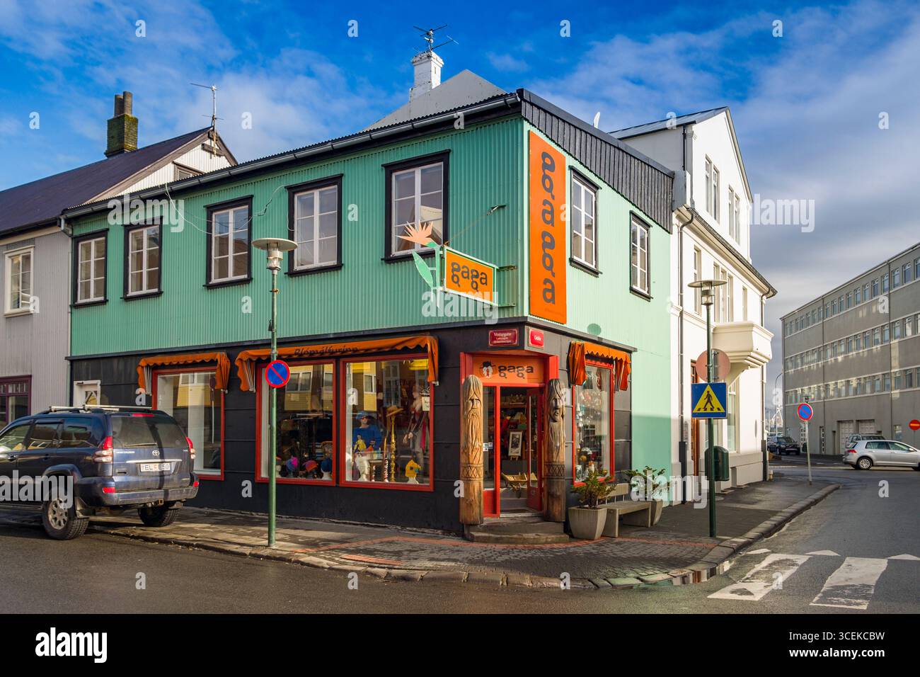 Colorful corrugated iron and steel clad retail building, Miðborg ...
