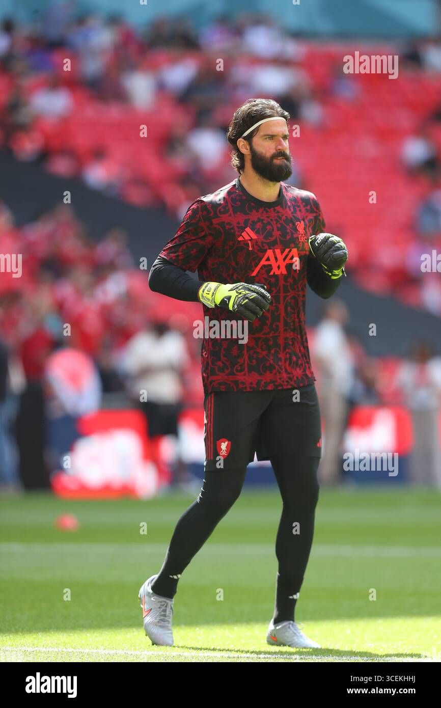 Goalkeeper Alisson Becker of Liverpool warms up ahead of kick-off ...