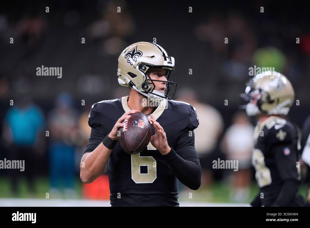 New Orleans Saints quarterback Tyler Shough (6) warms up before an NFL ...