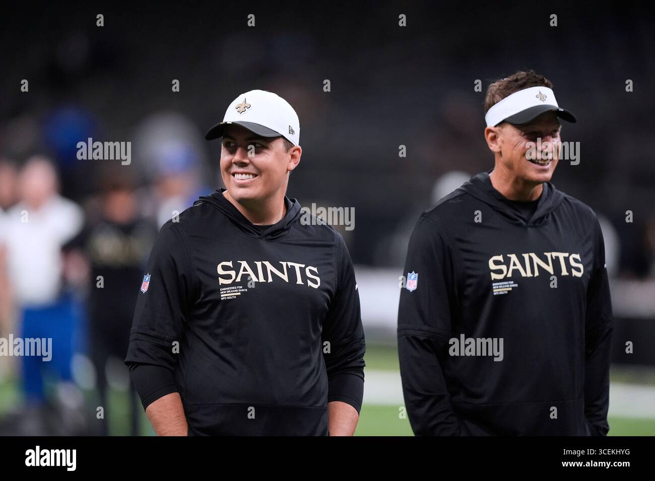 New Orleans Saints head coach Kellen Moore, left, and offensive ...