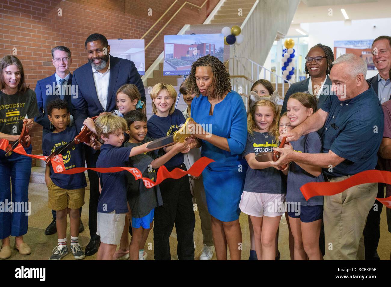 District of Columbia Mayor Muriel Bowser, center, takes part in a ...