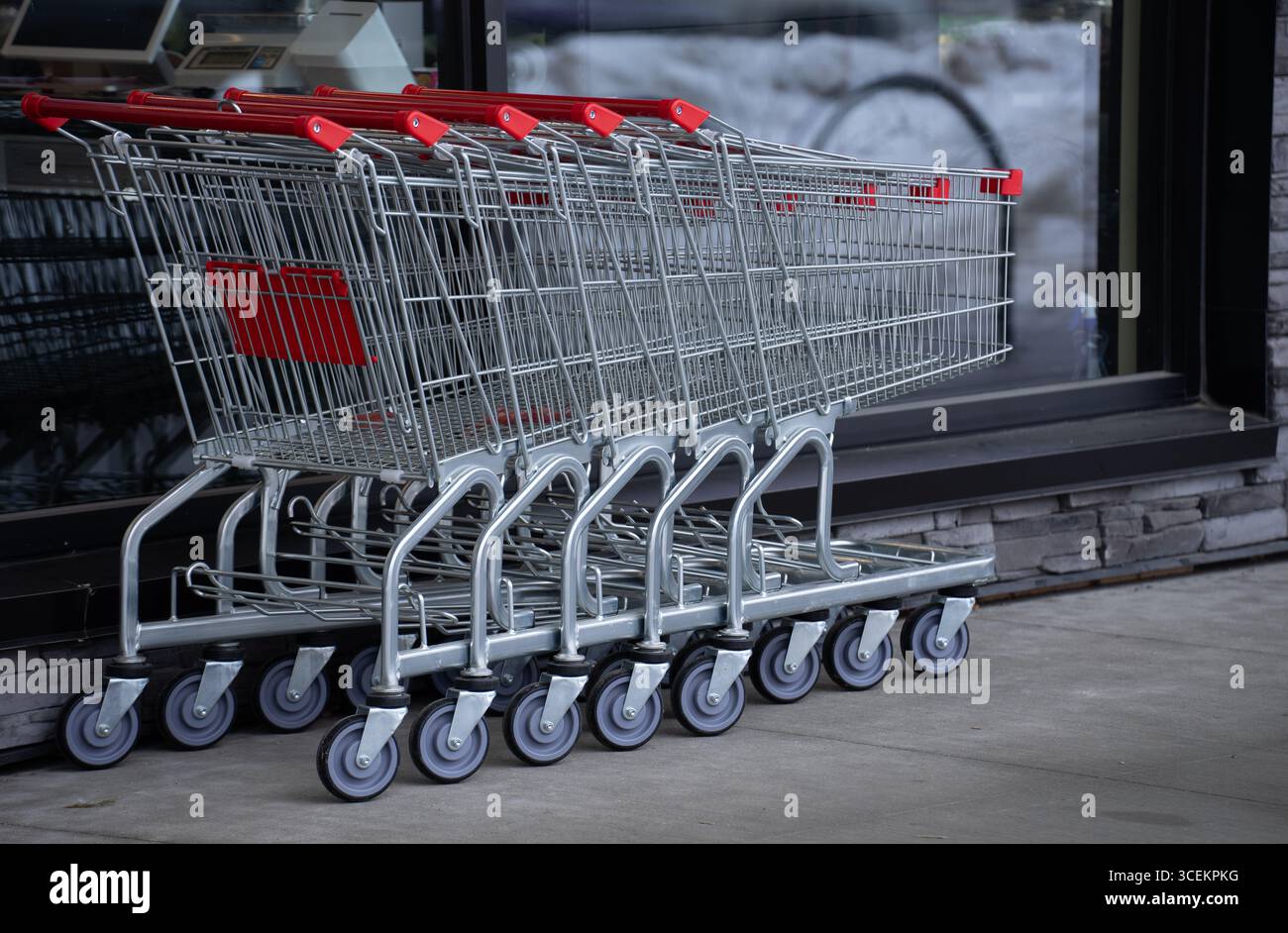 Stacked grocery carts hi-res stock photography and images - Alamy