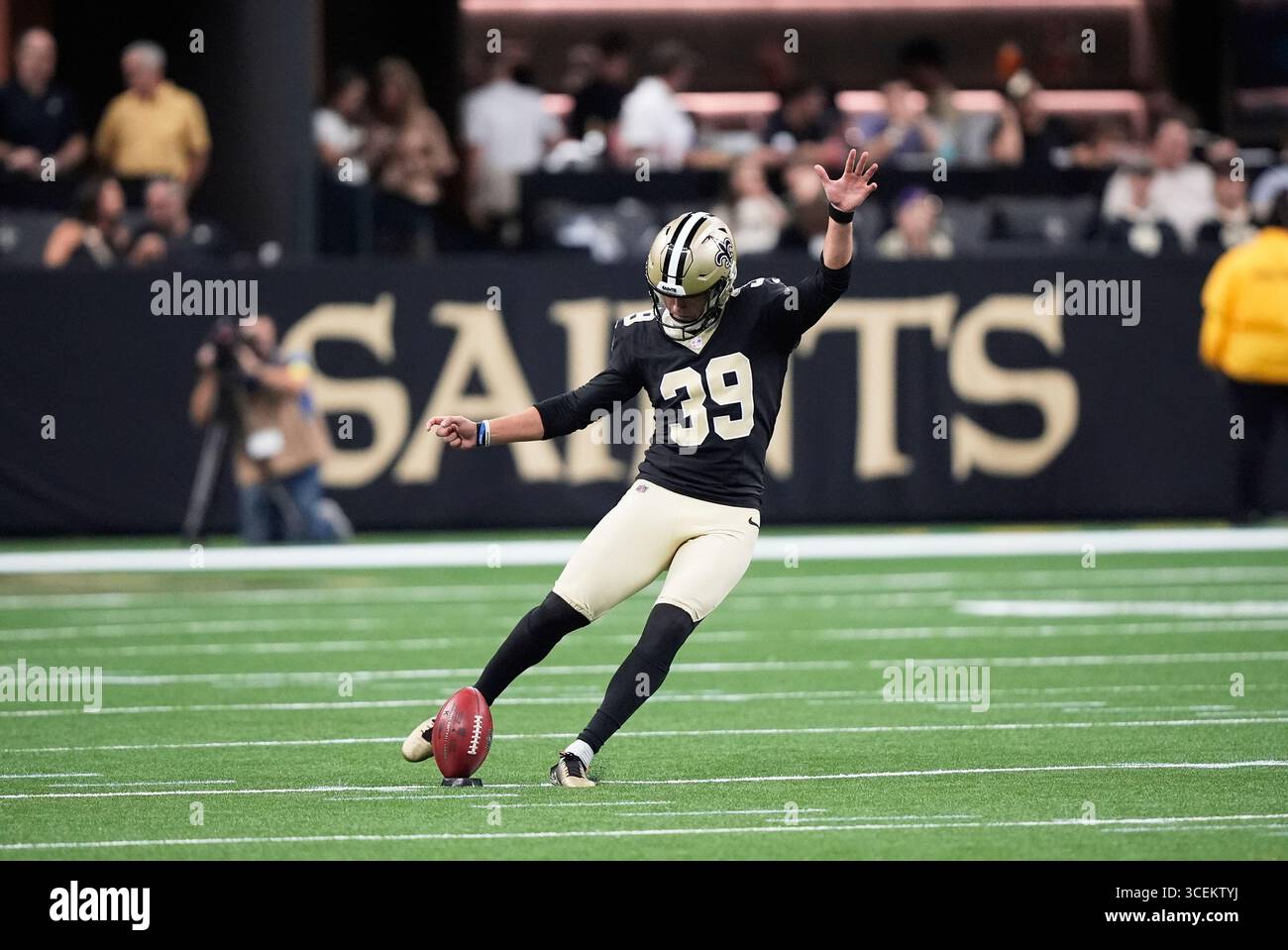 New Orleans Saints place kicker Charlie Smyth (39) kicks off in the ...