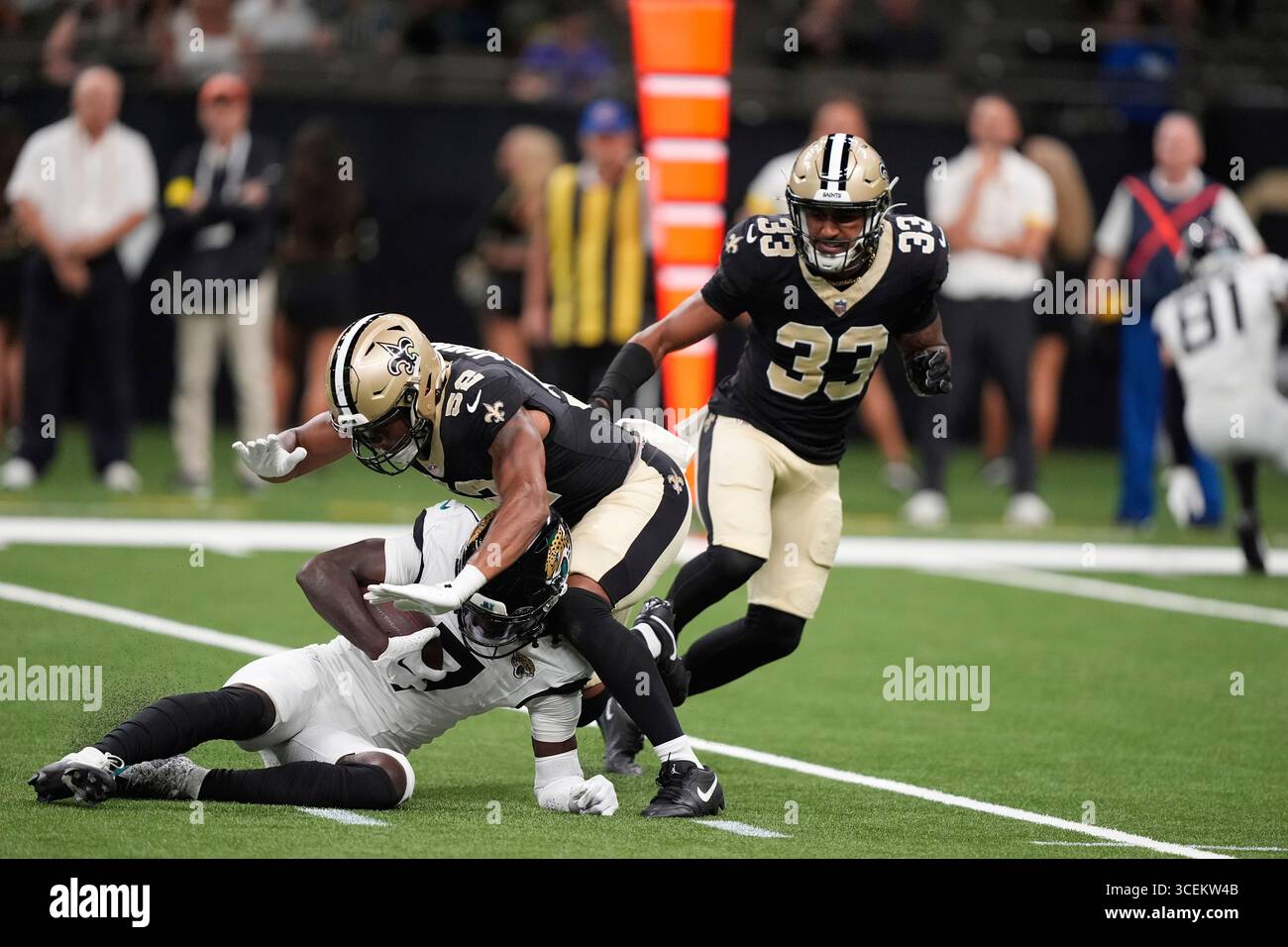 Jacksonville Jaguars wide receiver Brian Thomas Jr. (7) is tackled by ...