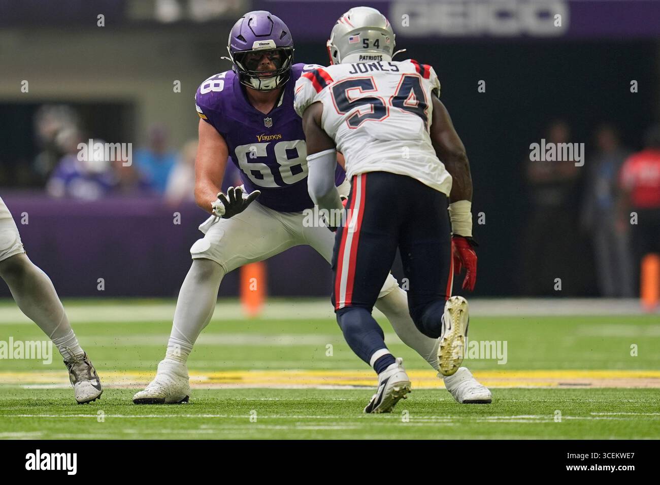Minnesota Vikings guard Henry Byrd (68) blocks against New England ...