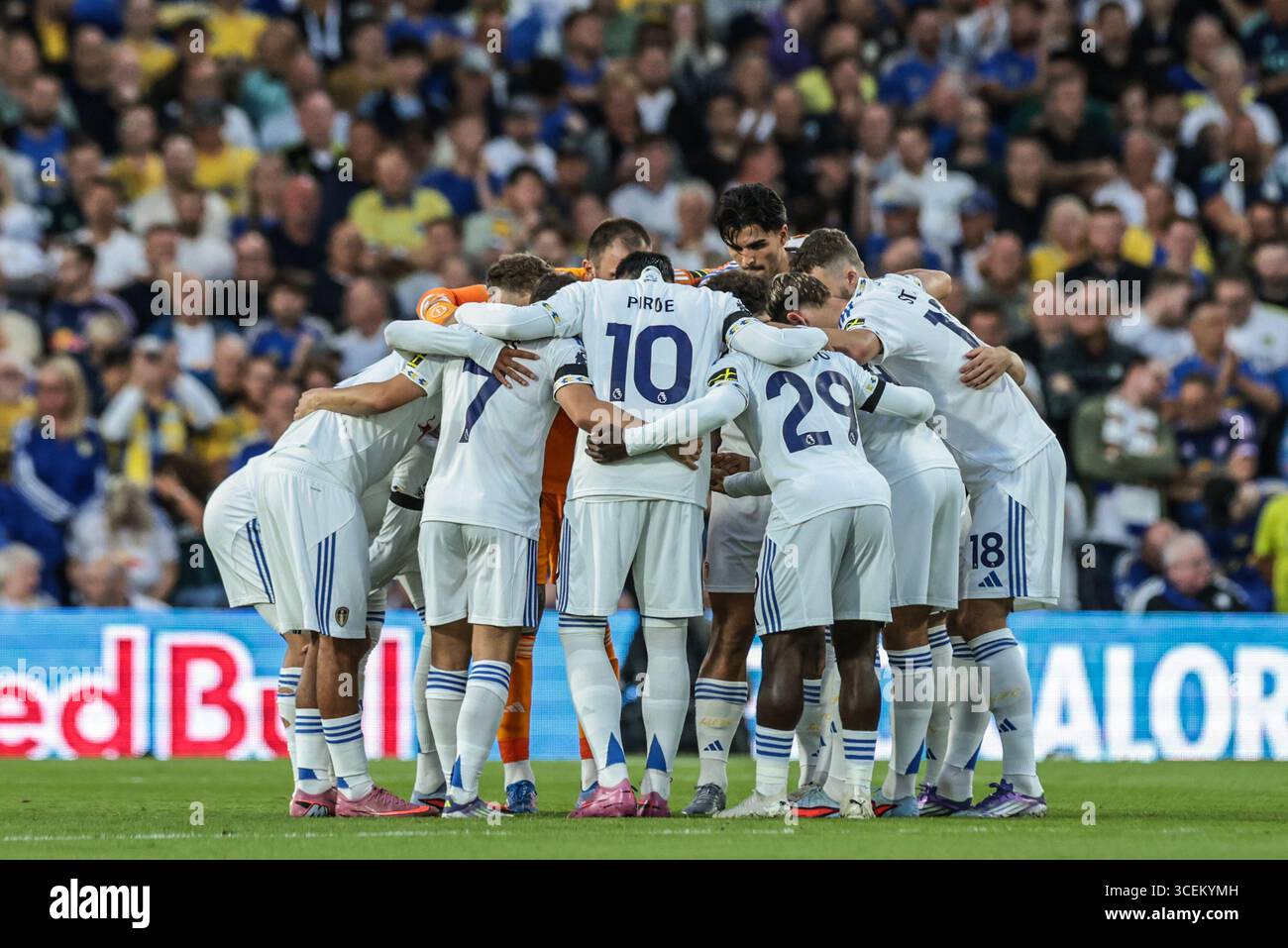 Leeds United players have a team huddle before the game during the ...