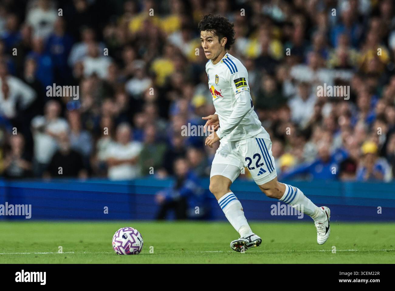 Ao Tanaka of Leeds United breaks with the ball during the Premier ...