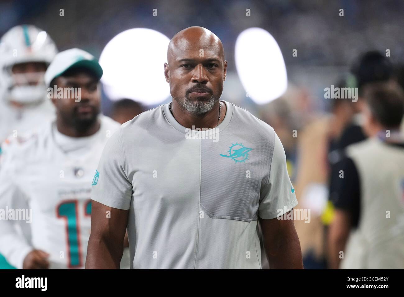 Miami Dolphins defensive coordinator Anthony Weaver walks to the locker ...