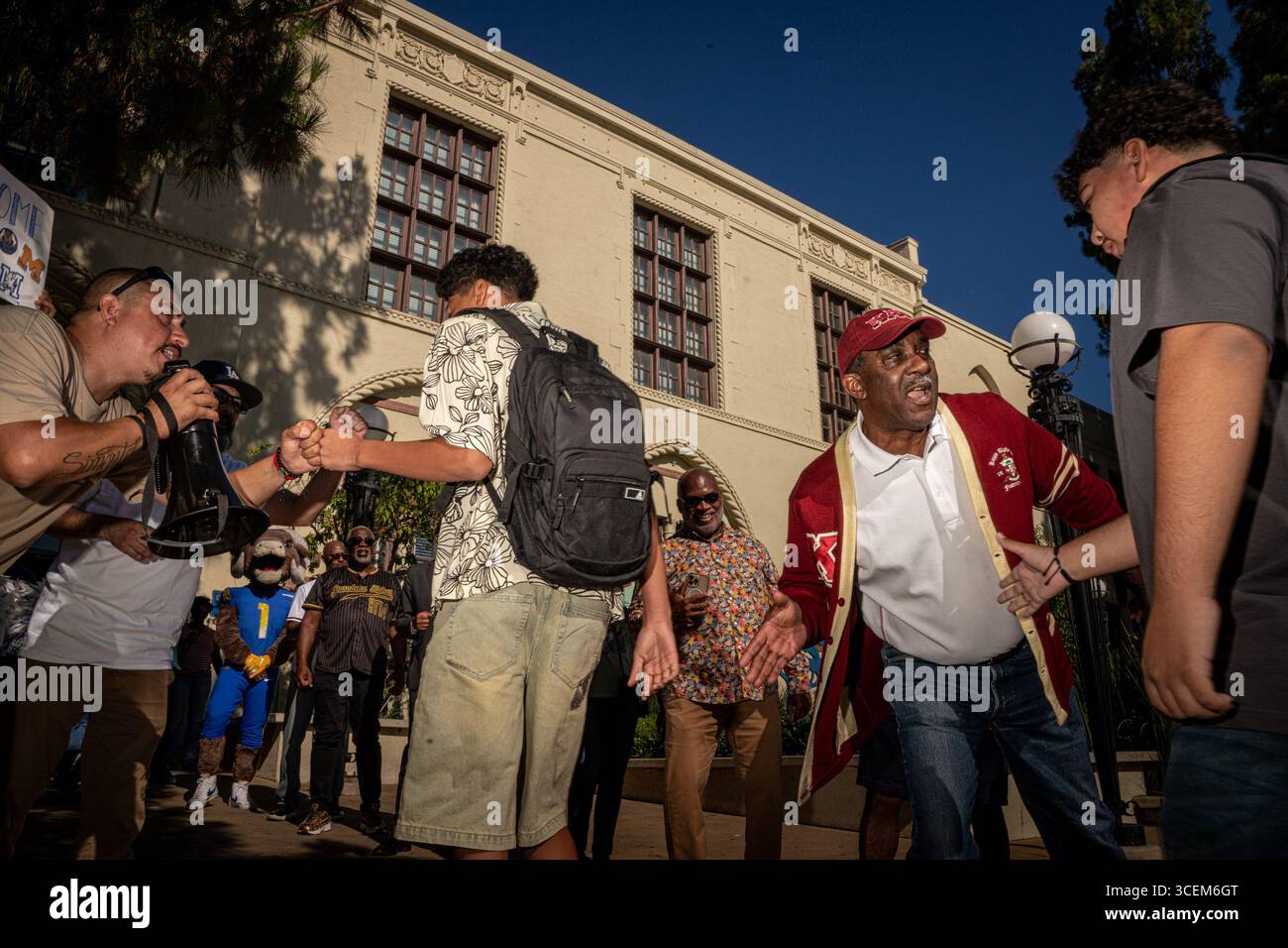 Pasadena, California, USA. 18th Aug, 2025. Community member Chuy and ...
