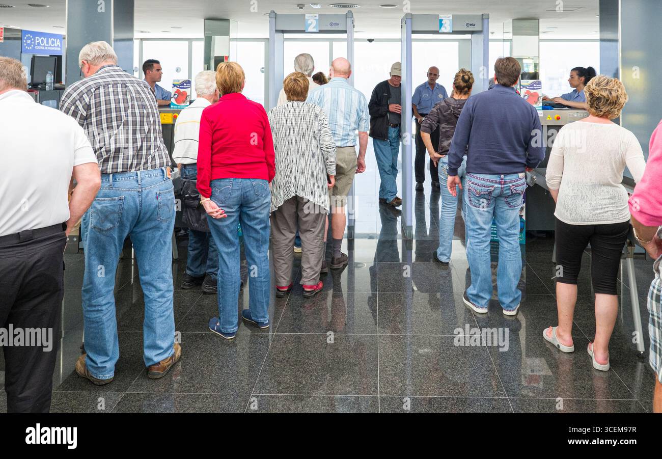 Cruise ship passengers at security check point before boarding ship ...