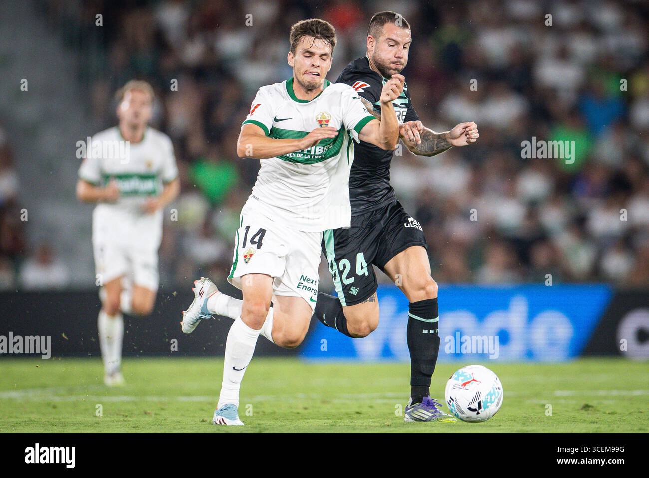 Aleix FEBAS of Elche CF and Aitor RUIBAL of Real Betis Balompie during ...