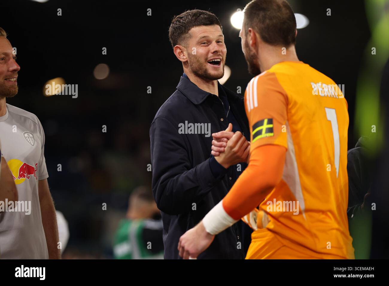 Illan Meslier (Leeds United) congratulates the new number one, Lucas ...
