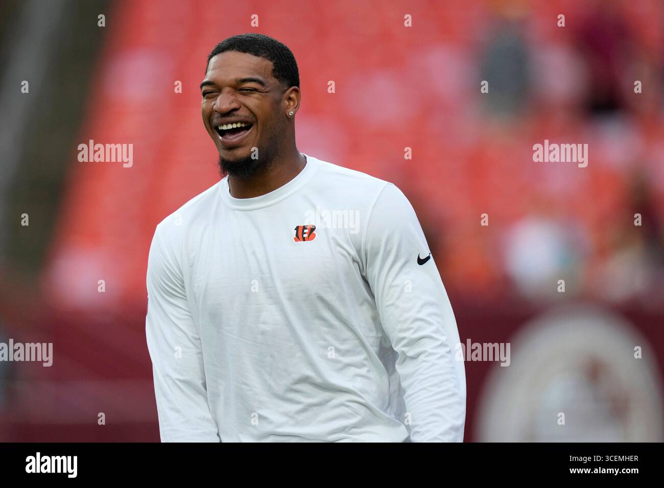 Cincinnati Bengals wide receiver Ja'Marr Chase laughs while warming up ...