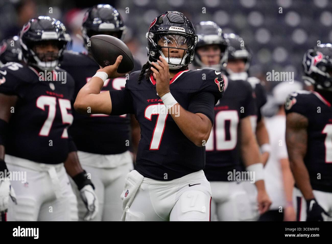 Houston Texans quarterback C.J. Stroud warms up before an NFL football ...