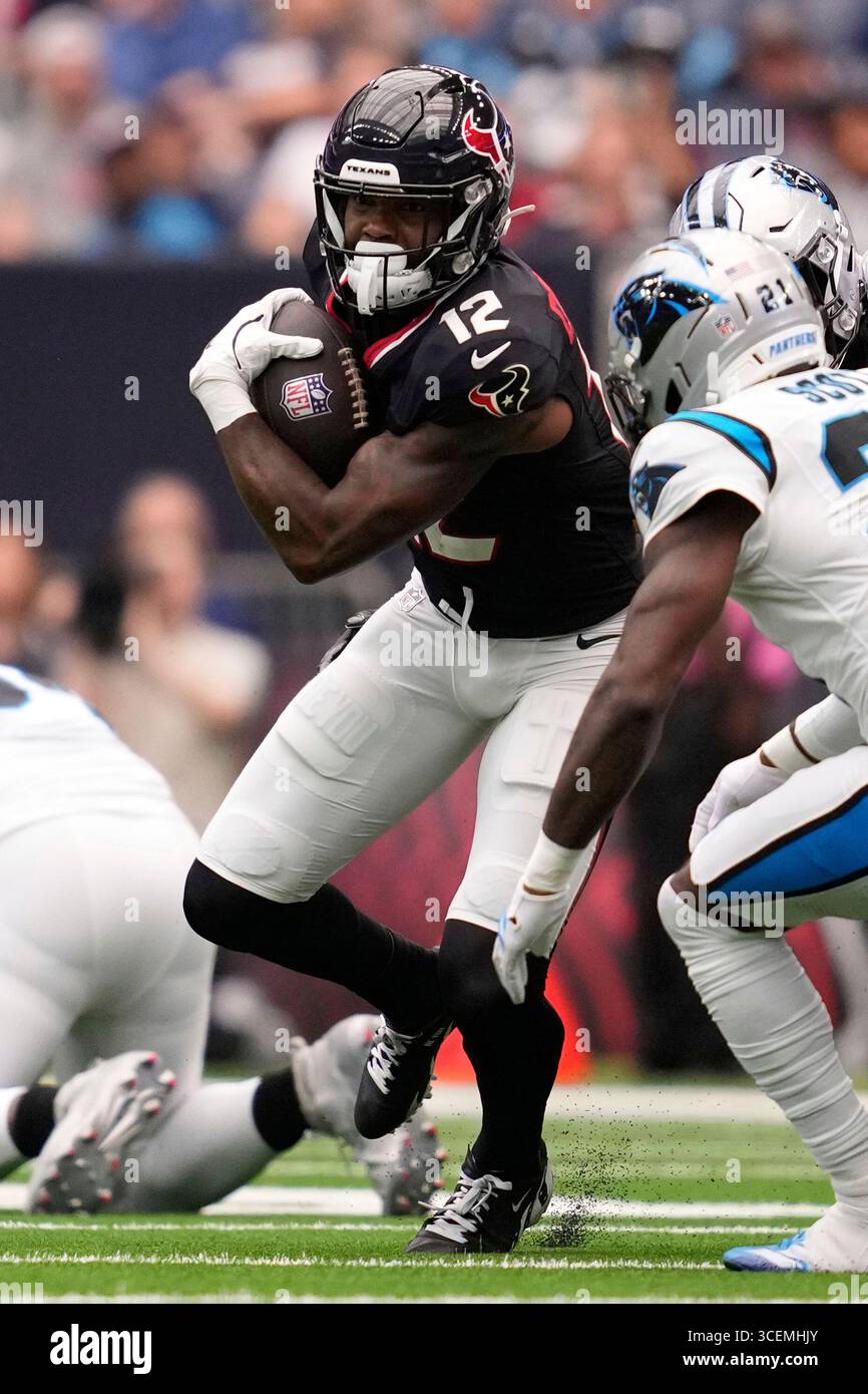 Houston Texans wide receiver Nico Collins (12) runs the ball during an ...