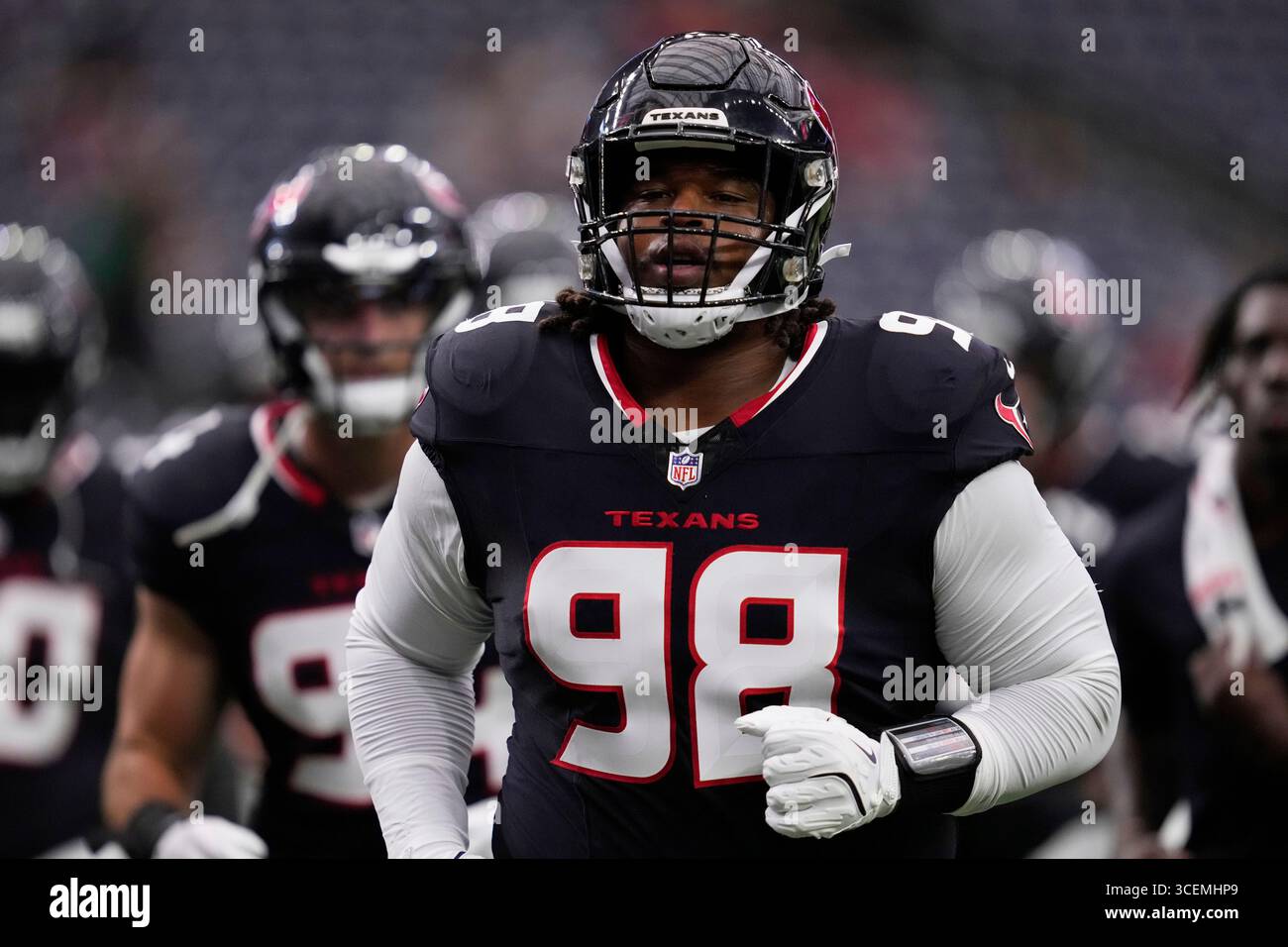 Houston Texans defensive tackle Tim Settle Jr. warms up before an NFL ...