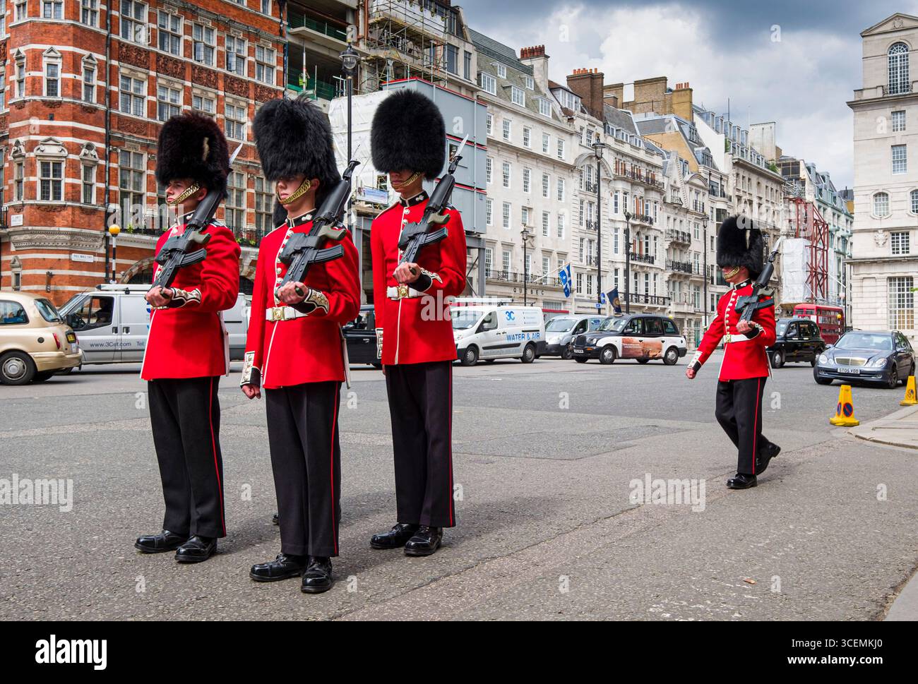 Grenadier Guards standing at attention holding L85A1 IW bullpup rifles ...