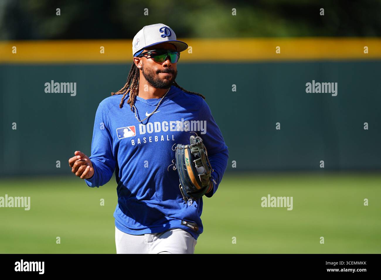 Los Angeles Dodgers outfielder Justin Dean warms up before a baseball ...