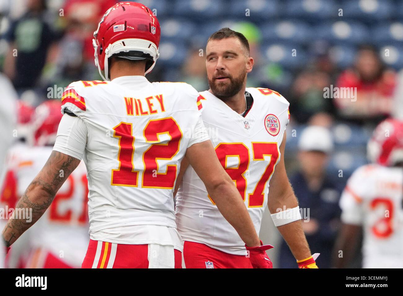 Kansas City Chiefs tight end Travis Kelce greets tight end Jared Wiley ...