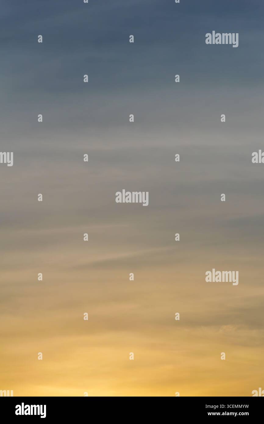The blue and golden colors of the sky during sunset (golden hour ...