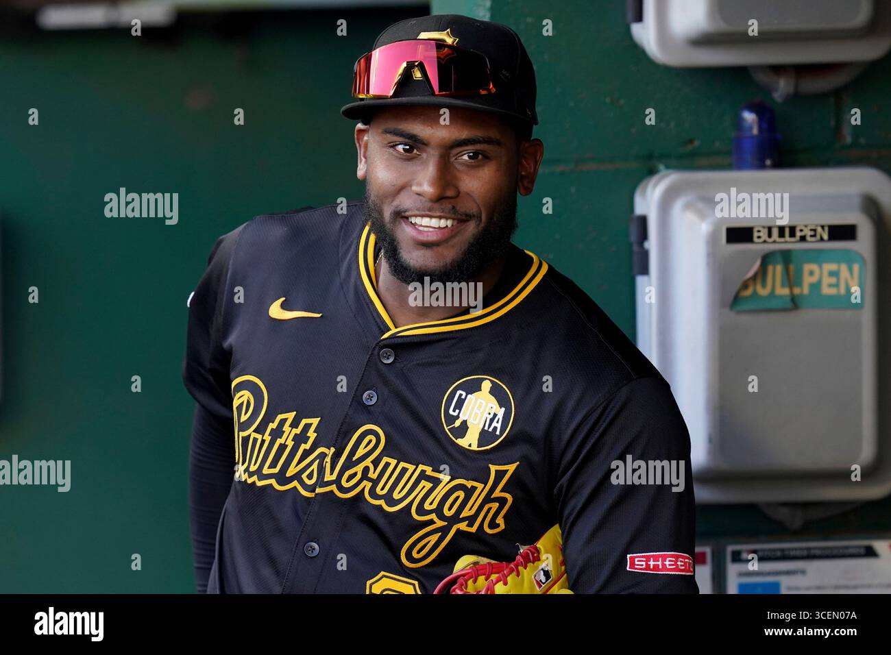Pittsburgh Pirates' Alexander Canario stands in the dugout before a ...