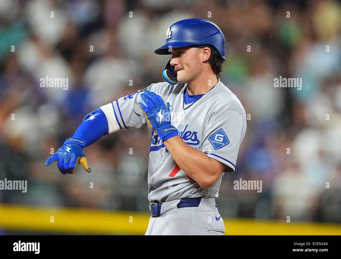 Los Angeles Dodgers' Alex Freeland gestures to the dugout after hitting ...