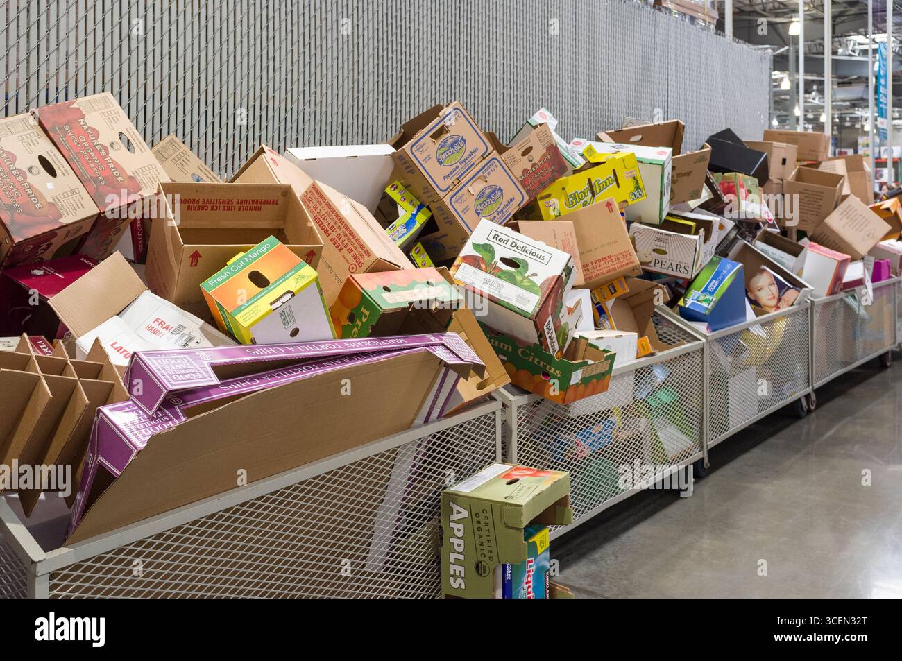 Corrugated cardboard boxes for customer use in metal wire bins at ...