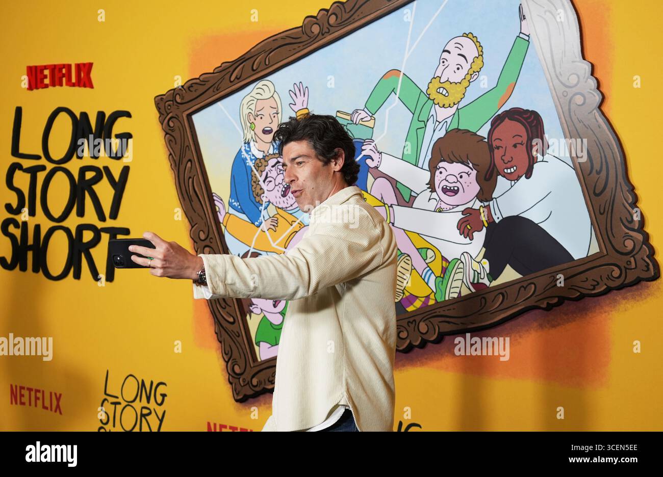 Max Greenfield, a cast member in "Long Story Short," shoots a selfie at ...