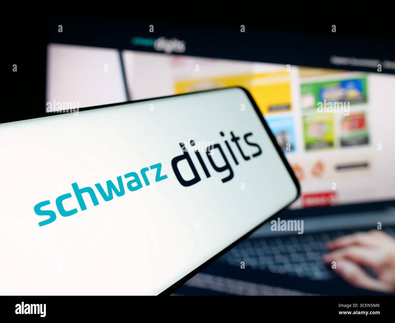 In this photo illustration, a smartphone with the logo of German IT company Schwarz Digits KG is ...