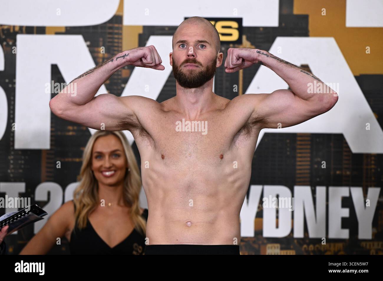 American boxer Mikey Dahlman poses following his weigh-in ahead of his ...