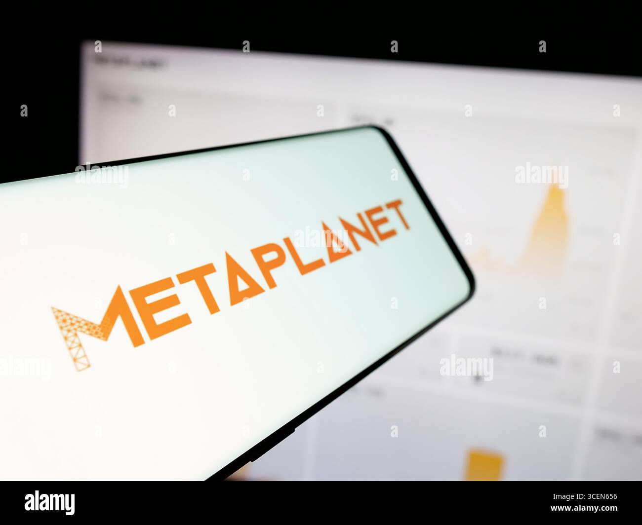 In this photo illustration, a smartphone with the logo of Japanese ...