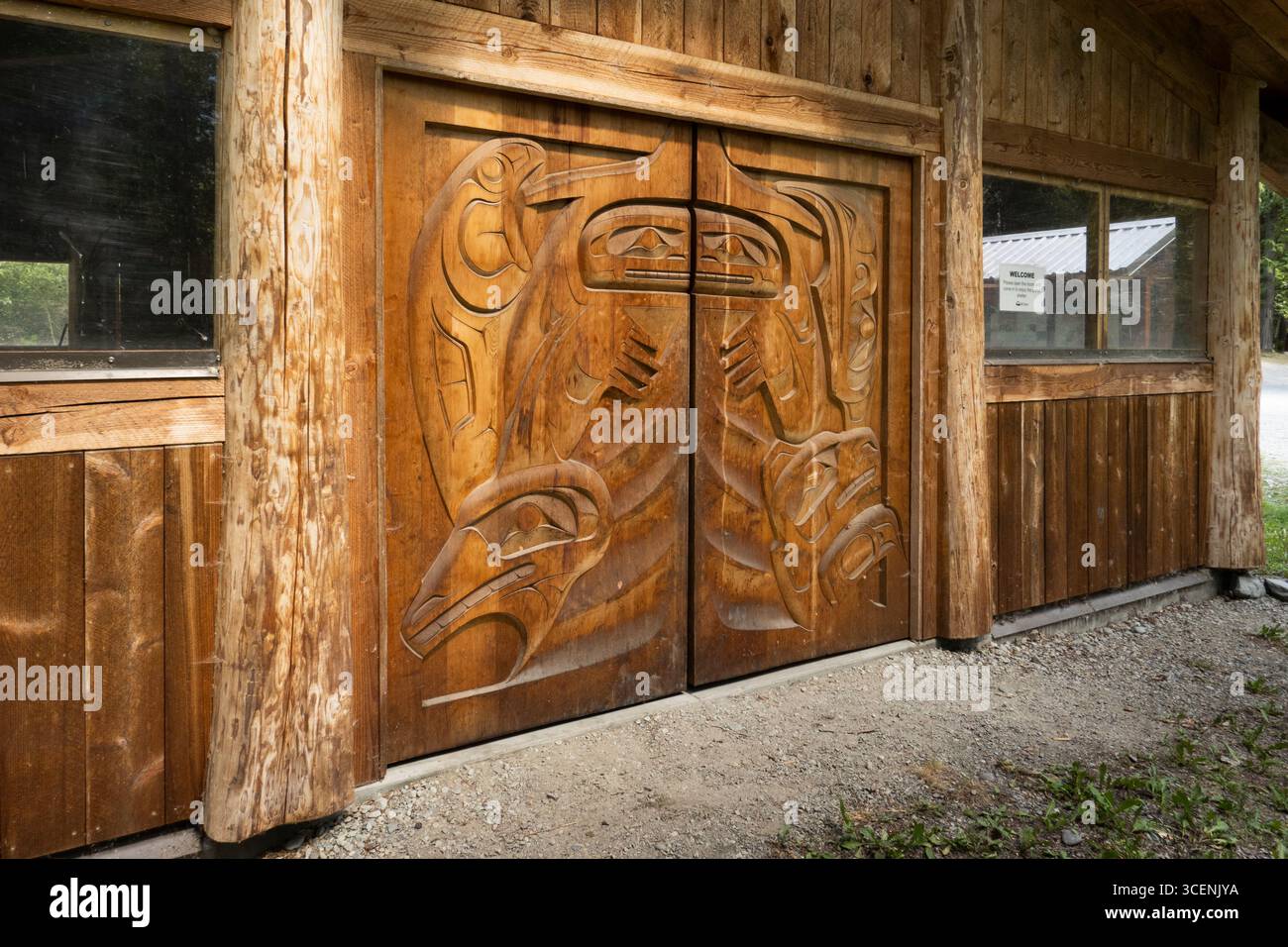 First Nations art on the doors of a picnic shelter by the Atnarko River ...
