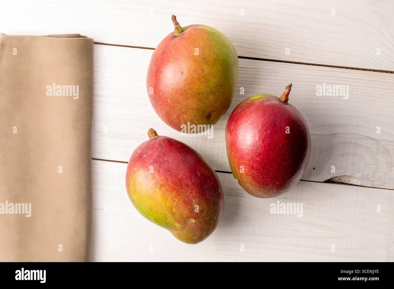 Sweet juicy mangoes on a table, top view, macro Stock Photo - Alamy