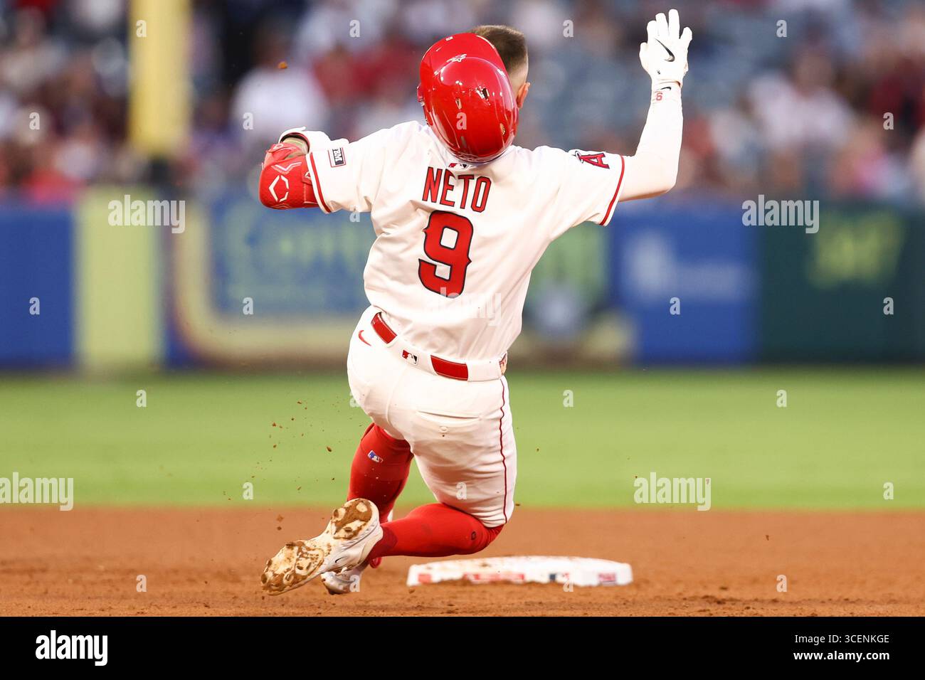 Los Angeles Angels' Zach Neto slides into second base after hitting a ...