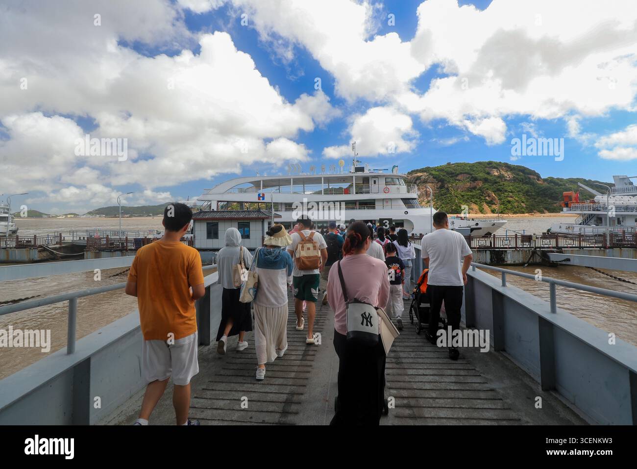 Tourists visit the Putuo Mountain scenic area in Zhoushan City, east ...