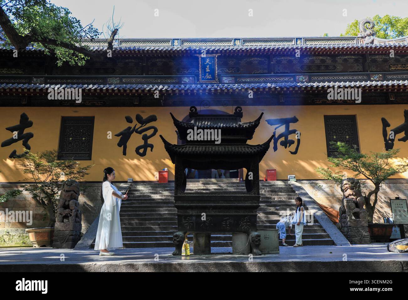 Tourists visit the Putuo Mountain scenic area in Zhoushan City, east ...