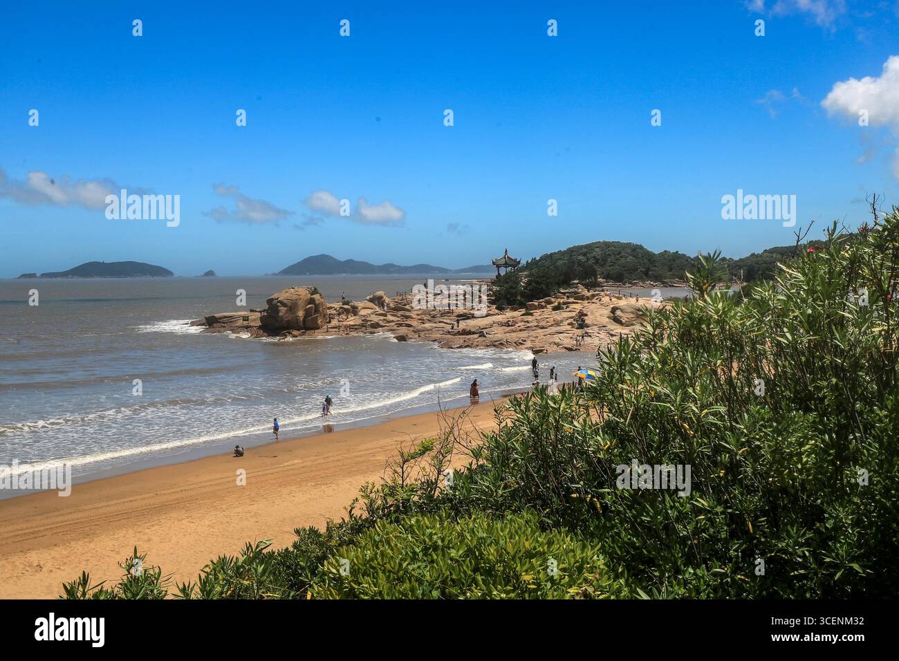 Tourists visit the Putuo Mountain scenic area in Zhoushan City, east ...