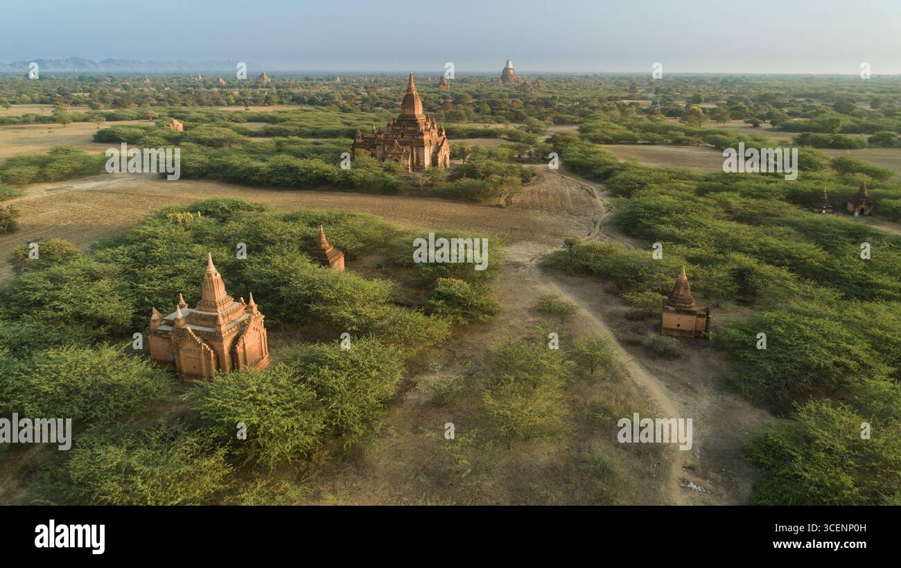 Aerial view of ancient temples rising from the verdant landscape, their ...